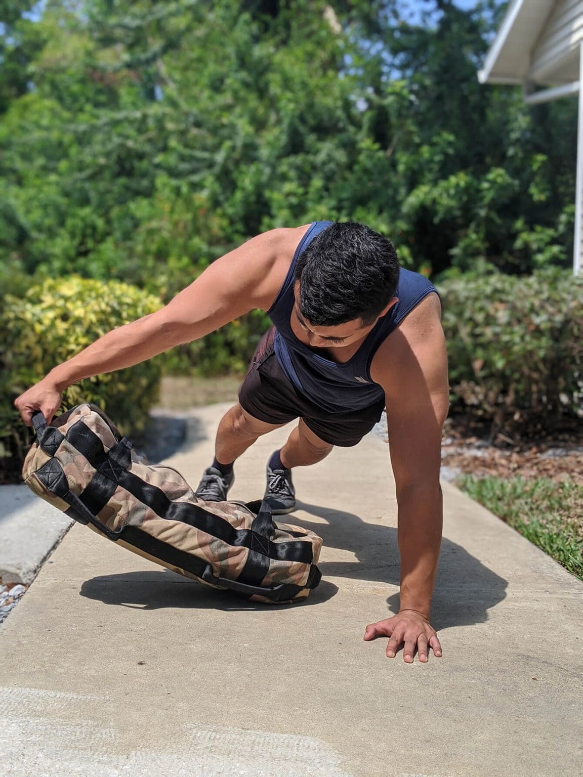 The Beginner Full-Body Sandbag Workout Routine - The Modest Man